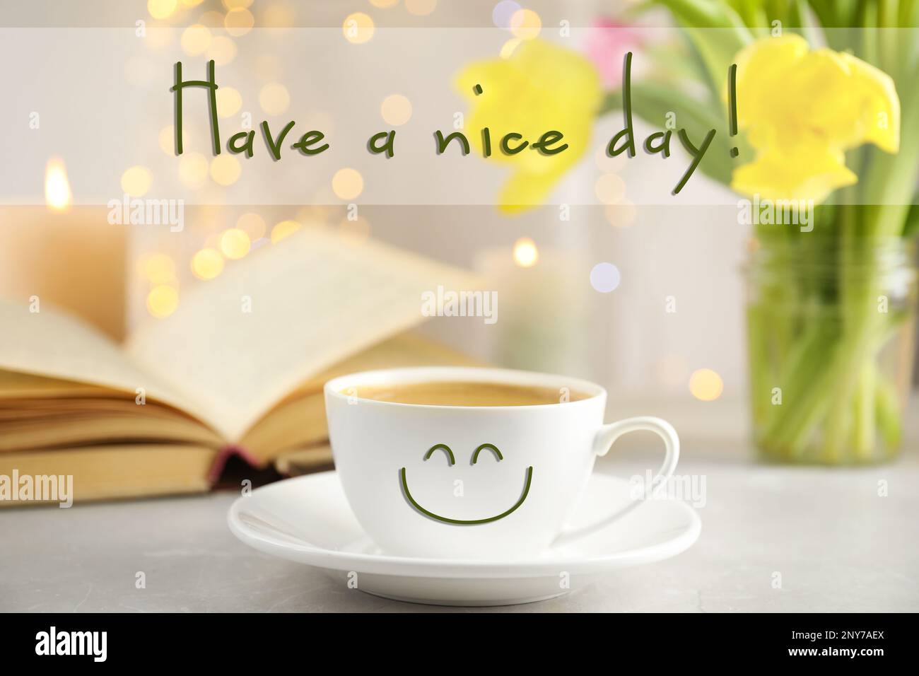 Text Have a nice day and cup of aromatic coffee on white table Stock ...
