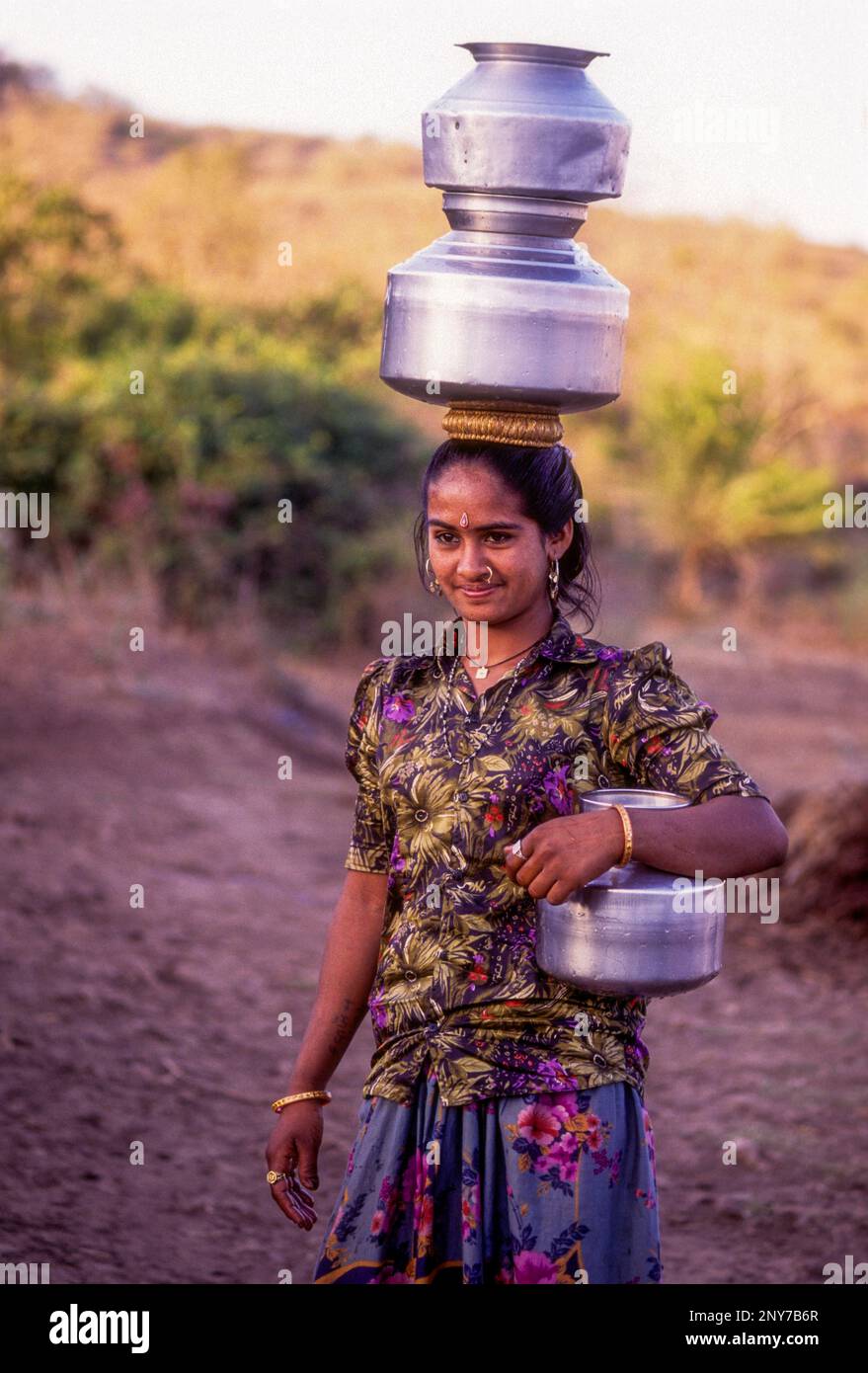 Maldhari girl carrying water at Sasan Gir, Gujarat, India, Asia Stock ...