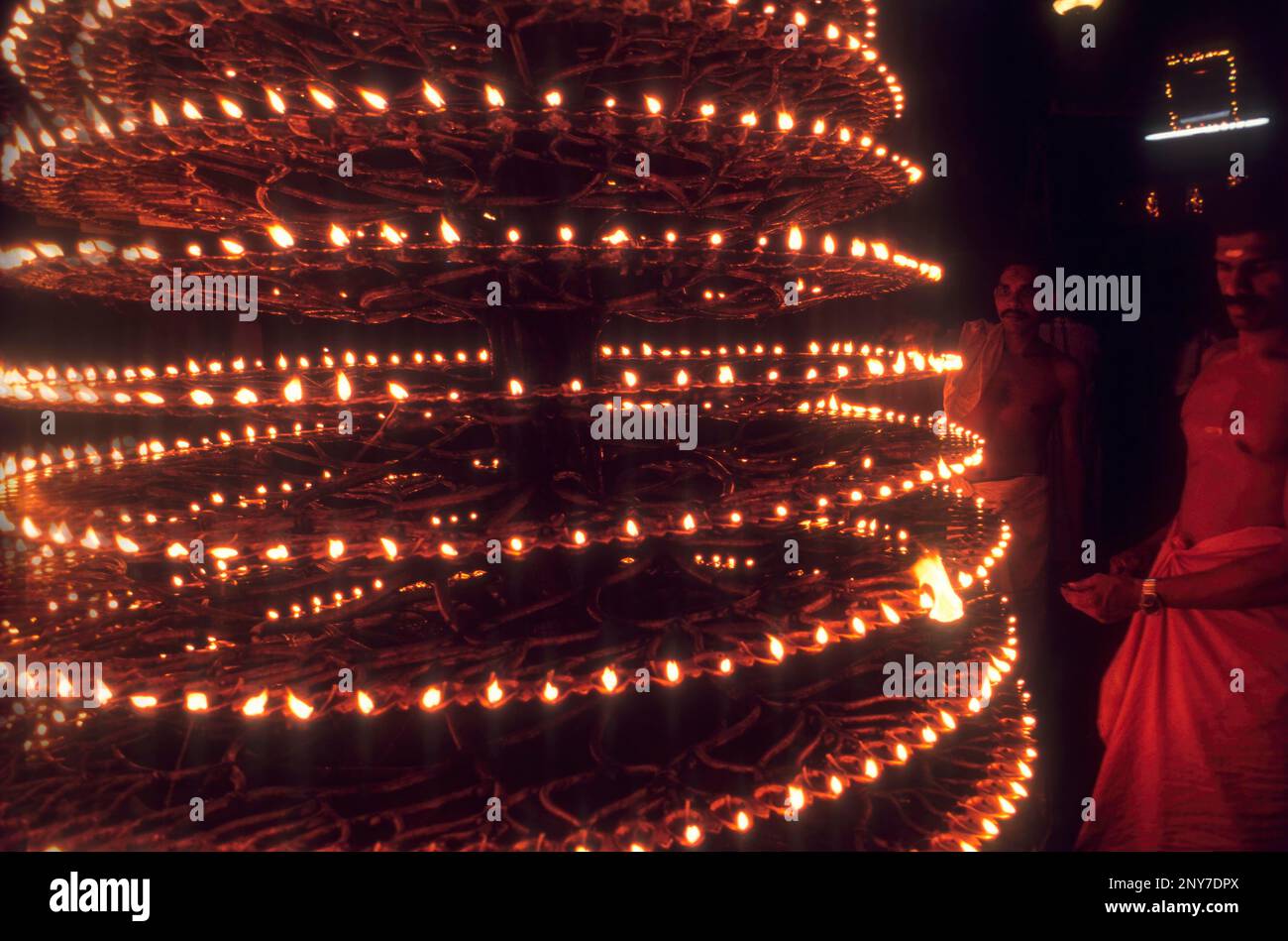 Big temple lamp in India. The 1000 wich oil lamp in the Chettikulangara ...