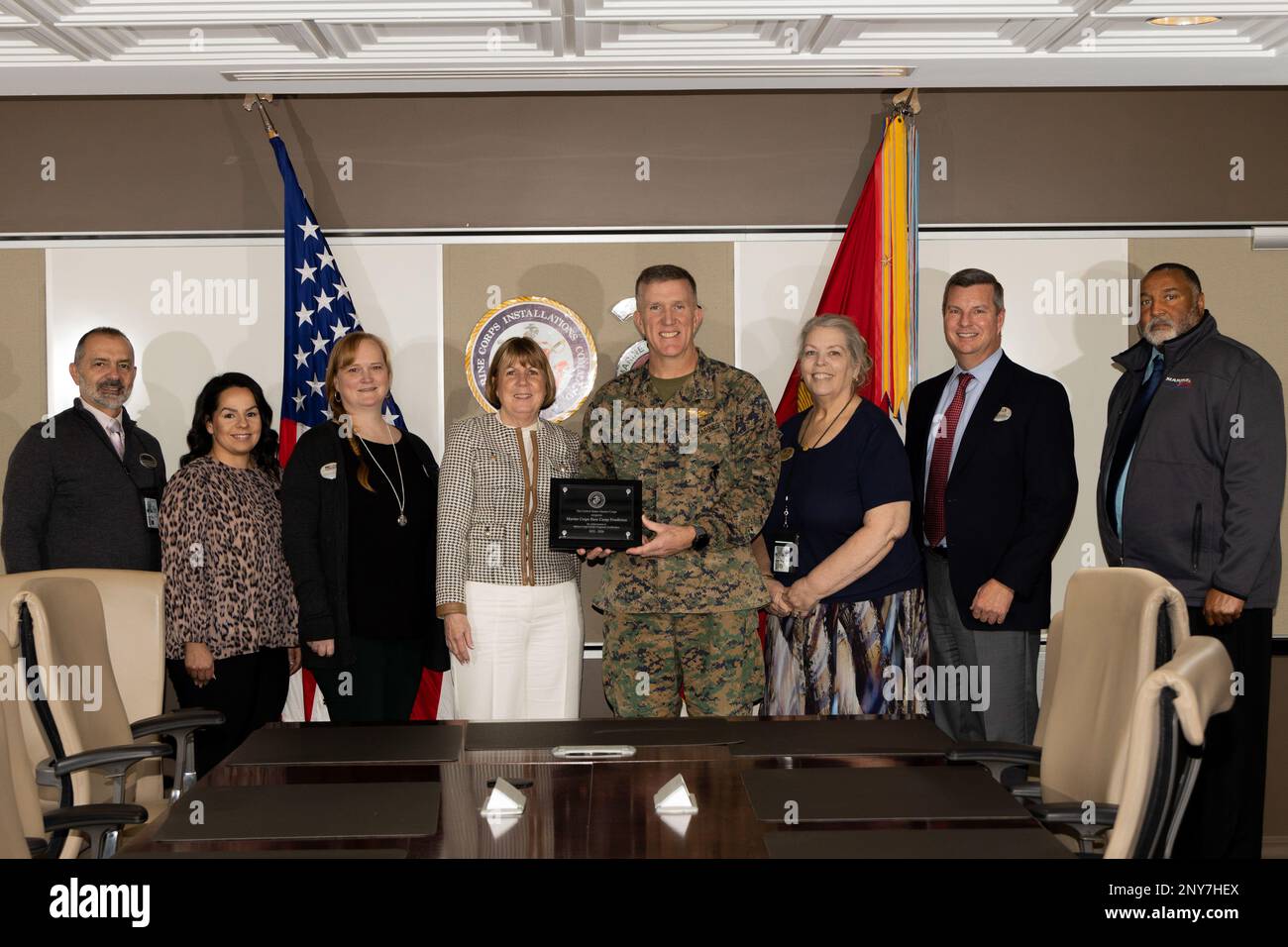 U.S. Marine Corps Brig. Gen. Jason Woodworth, center, the commanding ...
