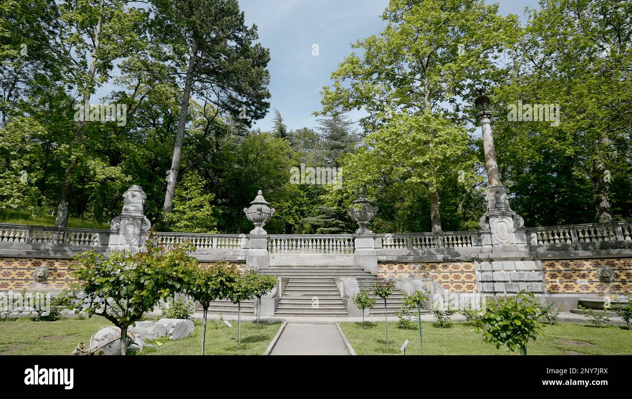 Sunny city green park with stairs and pillars. Action. Magical forest ...