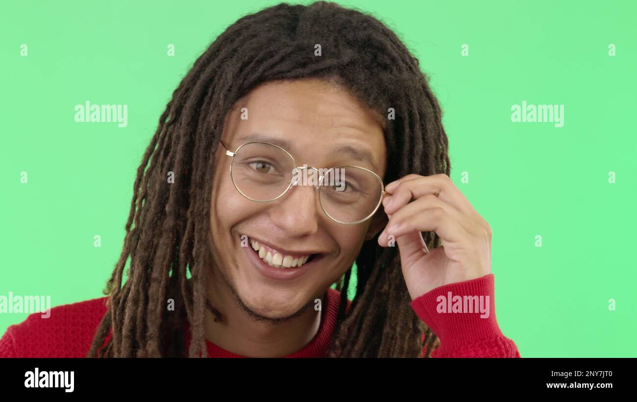 Happy, face and man with glasses in studio with a positive, optimistic ...