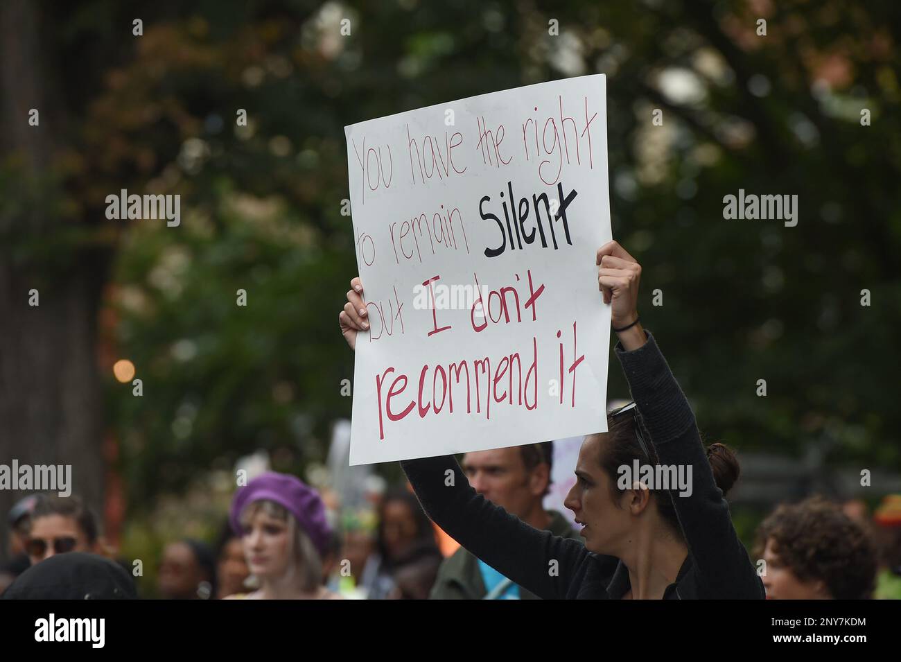 SEP 30, 2017 : Marchers hold their signs high in Lincoln Park during ...