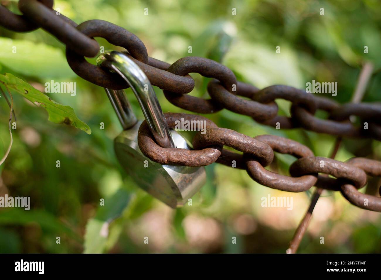 In this Aug. 16, 2017 photo, a chain on a gate at an old tannery waste ...