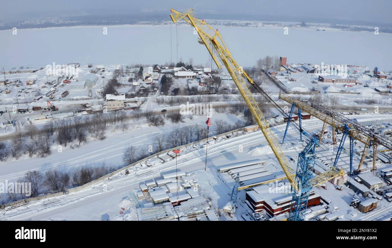 Industrial aerial background with the crane at the construction site ...