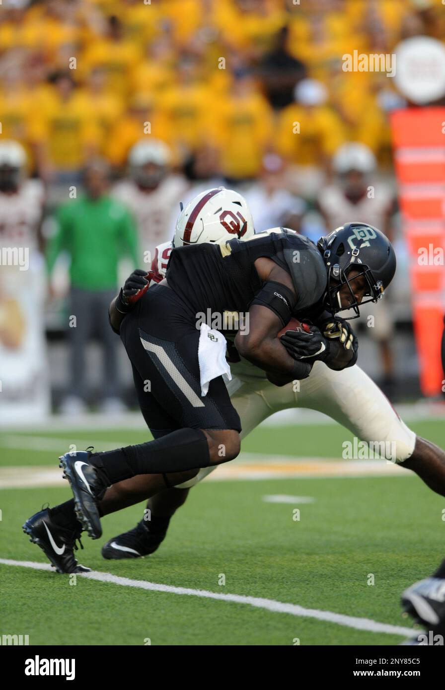 WACO, TX - SEPTEMBER 23: Baylor RB Terence Williams is tackled by an ...