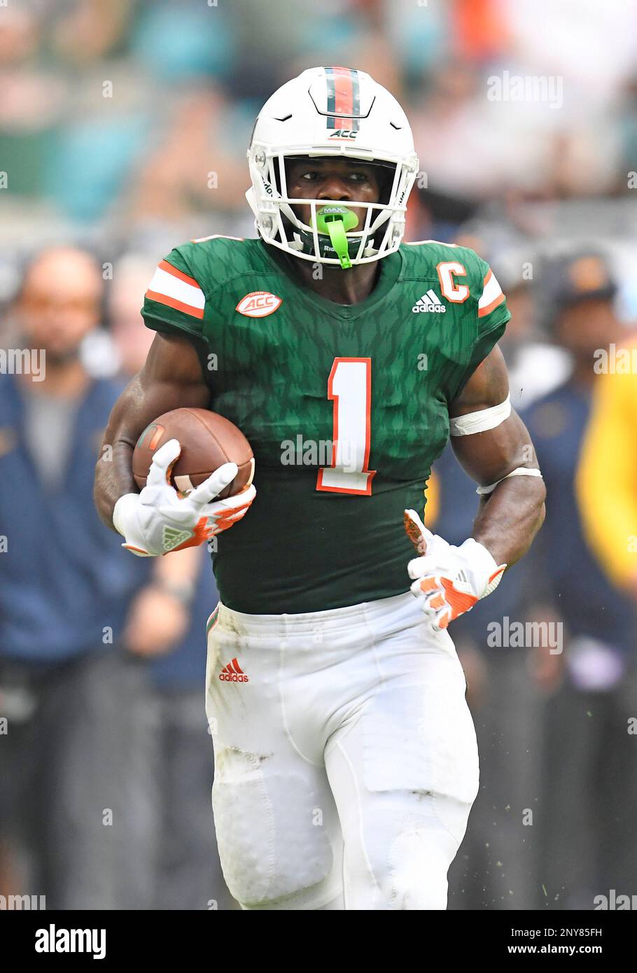 MIAMI GARDENS, FL - SEPTEMBER 23: University of Miami running back Mark ...