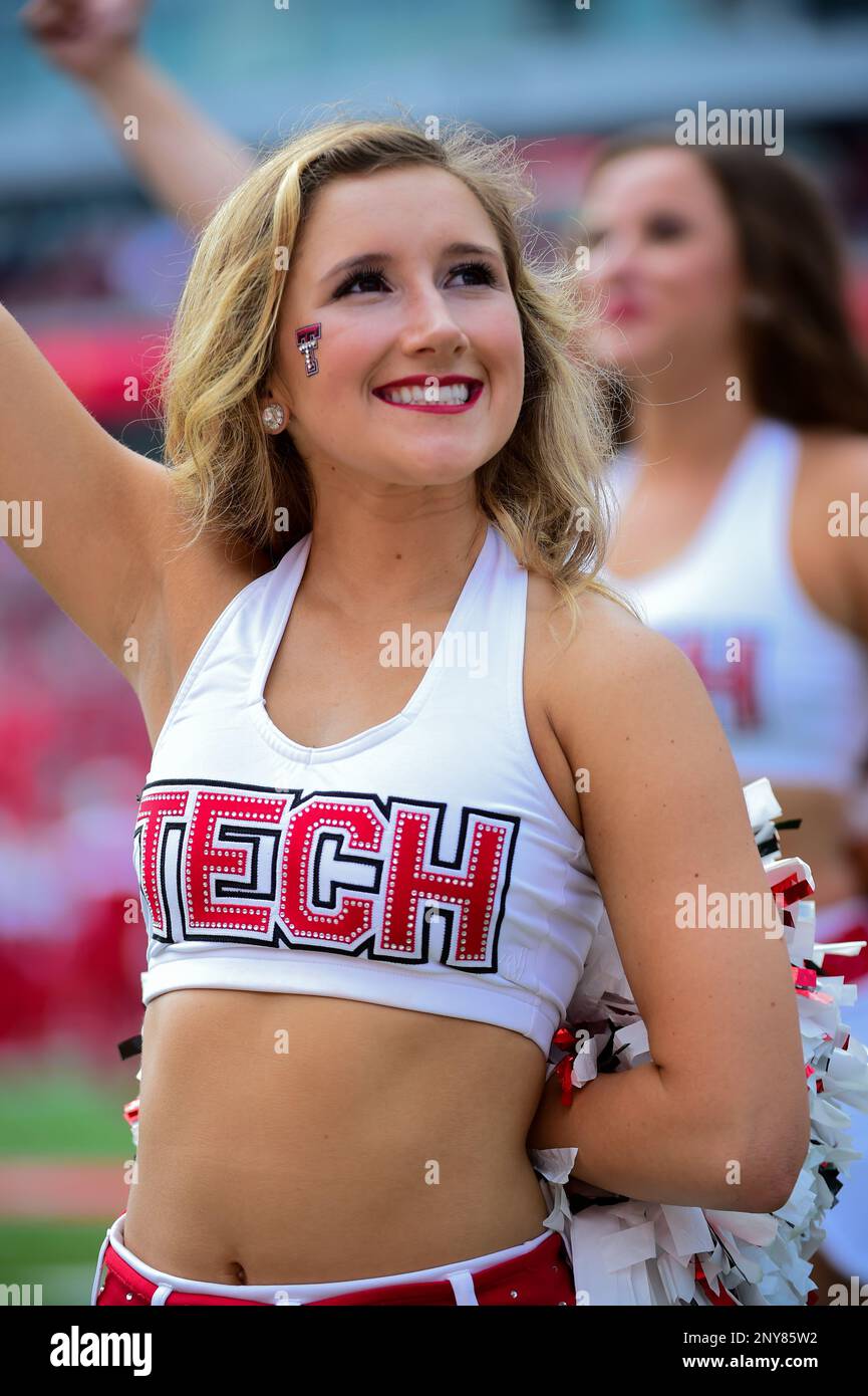 HOUSTON, TX - SEPTEMBER 23: Texas Tech cheerleader riles the crowd ...