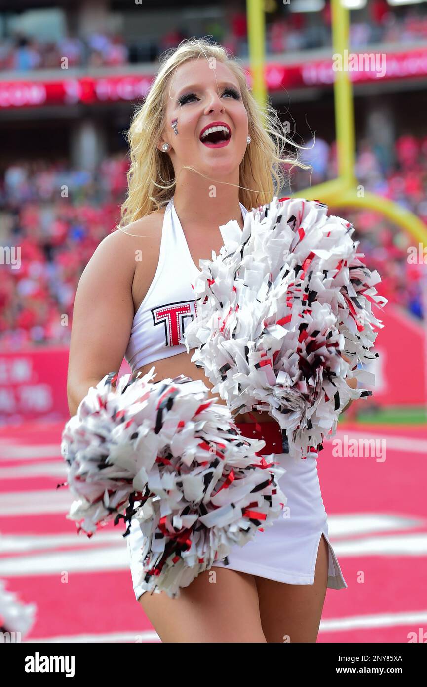 HOUSTON, TX - SEPTEMBER 23: Texas Tech cheerleader riles the crowd ...