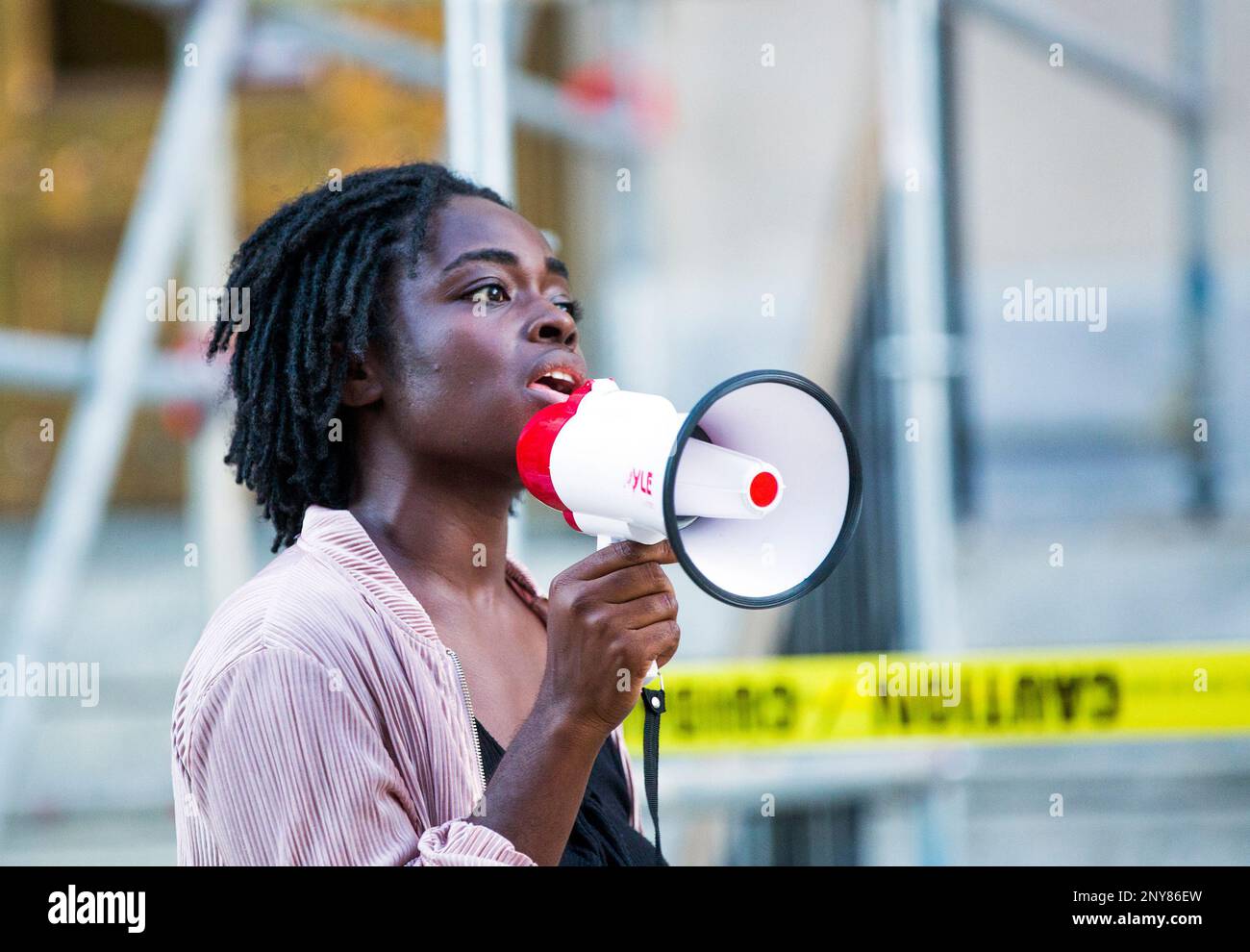 Melissa Gamble chants during a protest outside the old Durham County ...