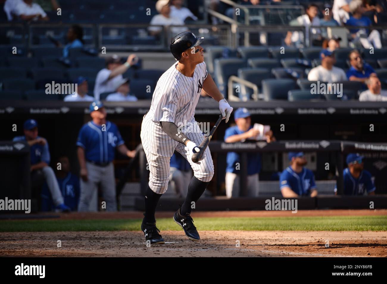New York Yankees outfielder Aaron Judge (99) hits his 50th home run of the season to break Mark ...