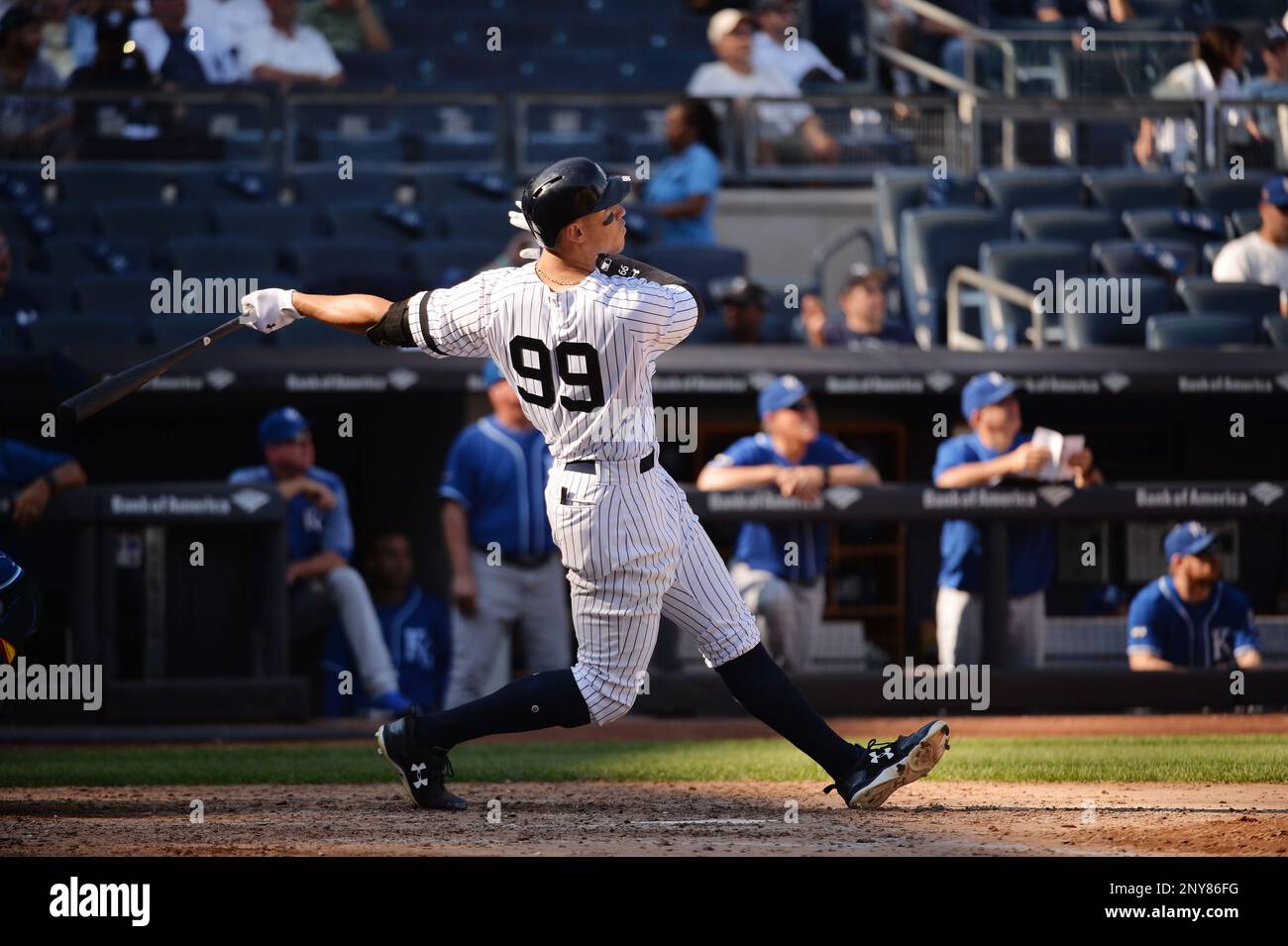 New York Yankees outfielder Aaron Judge (99) hits his 50th home run of the season to break Mark ...