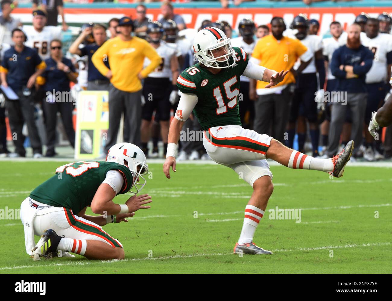 Miami kicker Michael Bagley (15) converts an extra point against Toledo ...