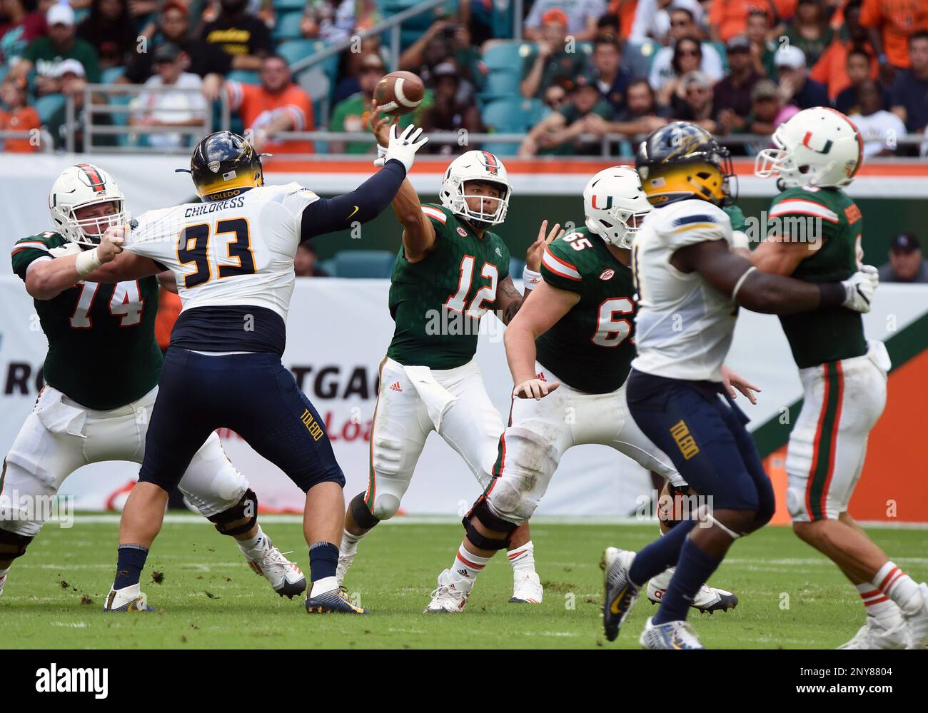 Miami quarterback Mark Rosier (12) releases a pass against Toledo ...