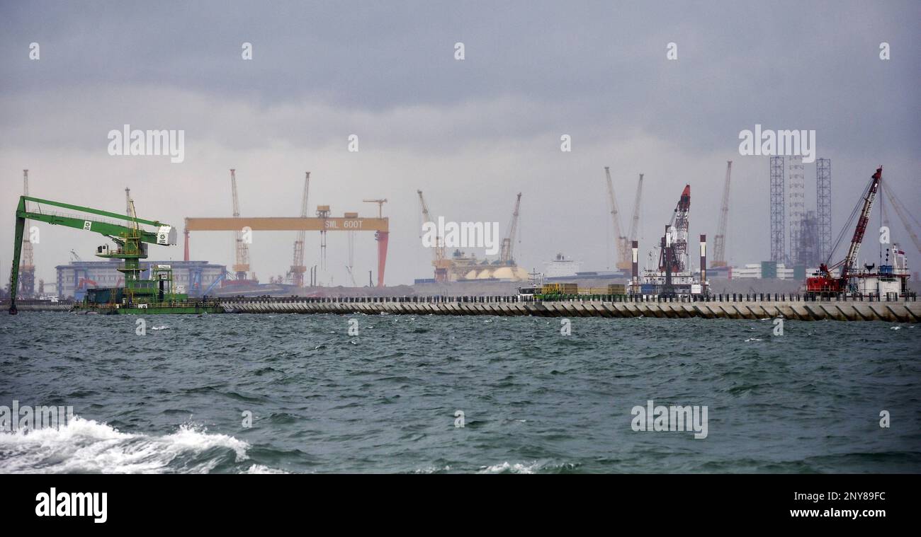 Caissons are used to build the wharf structure. The 28m-high concrete ...