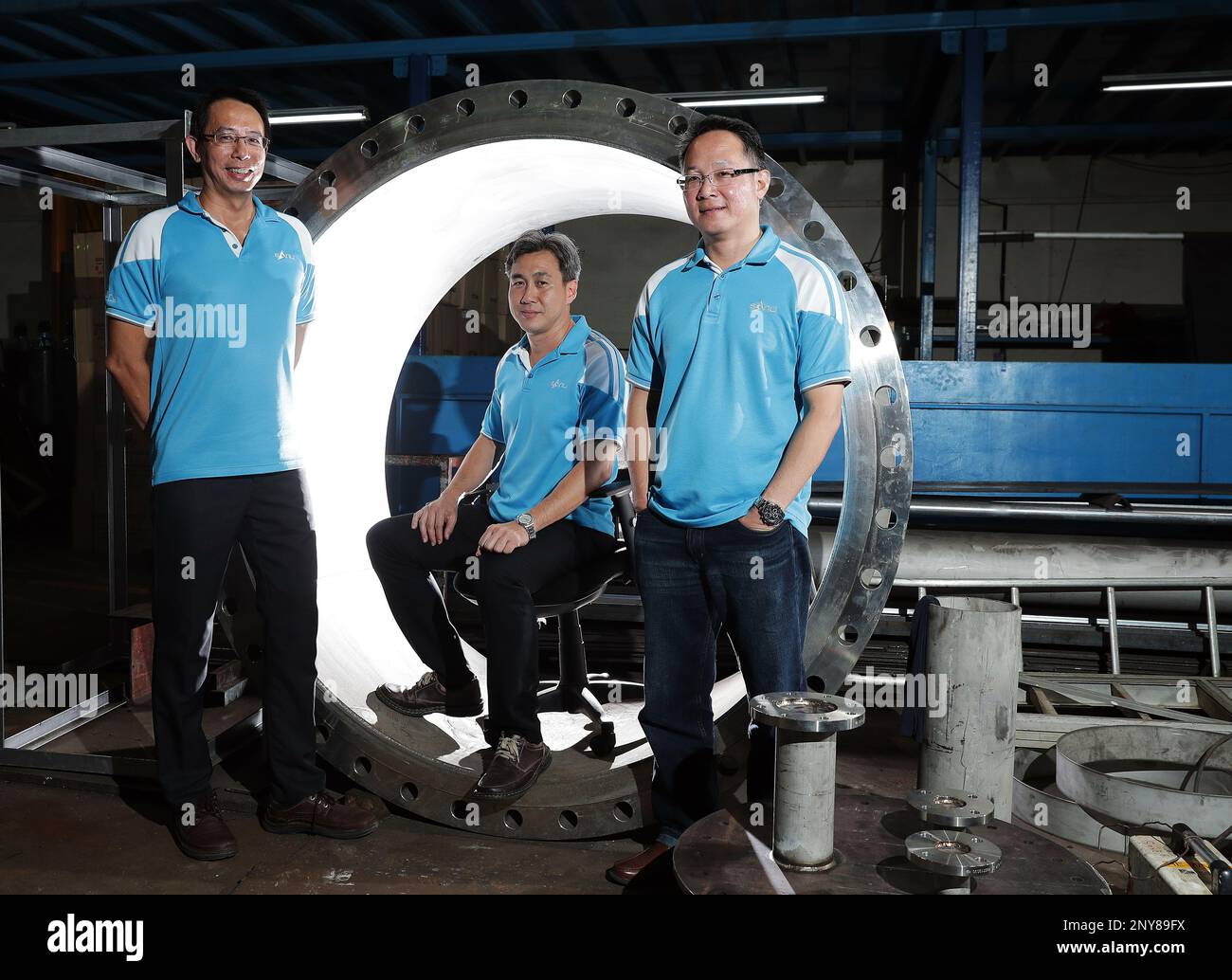 (left to right) Sanli Executive directors Lee Tien Chiat, Sim Hock Heng, CEO Sanli Environmental ...