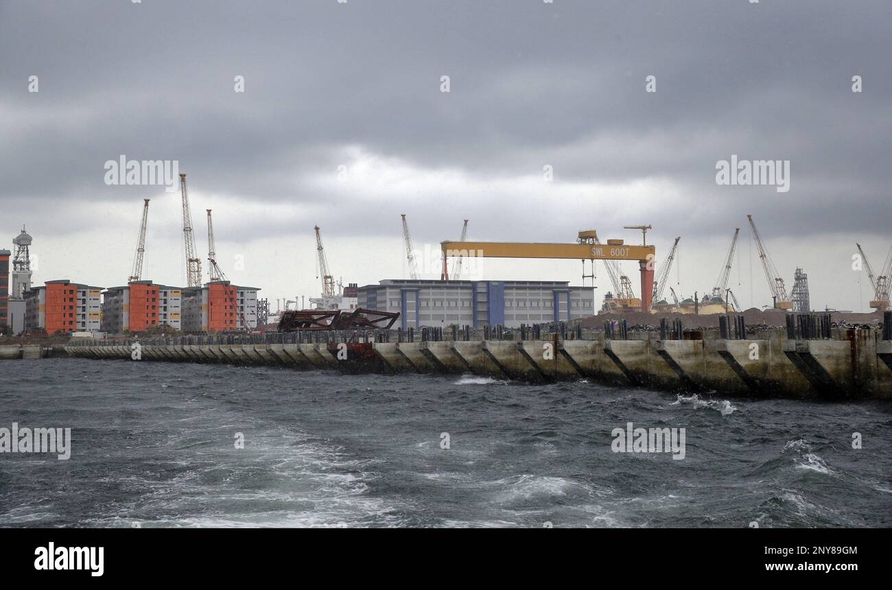 Caissons are used to build the wharf structure. The 28m-high concrete ...