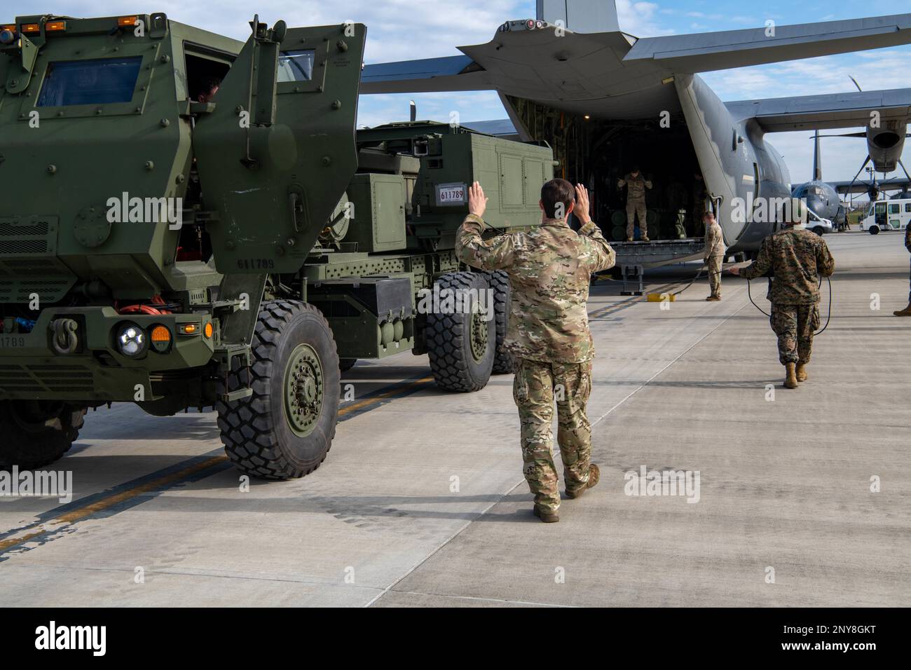 A loadmaster assigned the 1st Special Operations Squadron marshals an ...