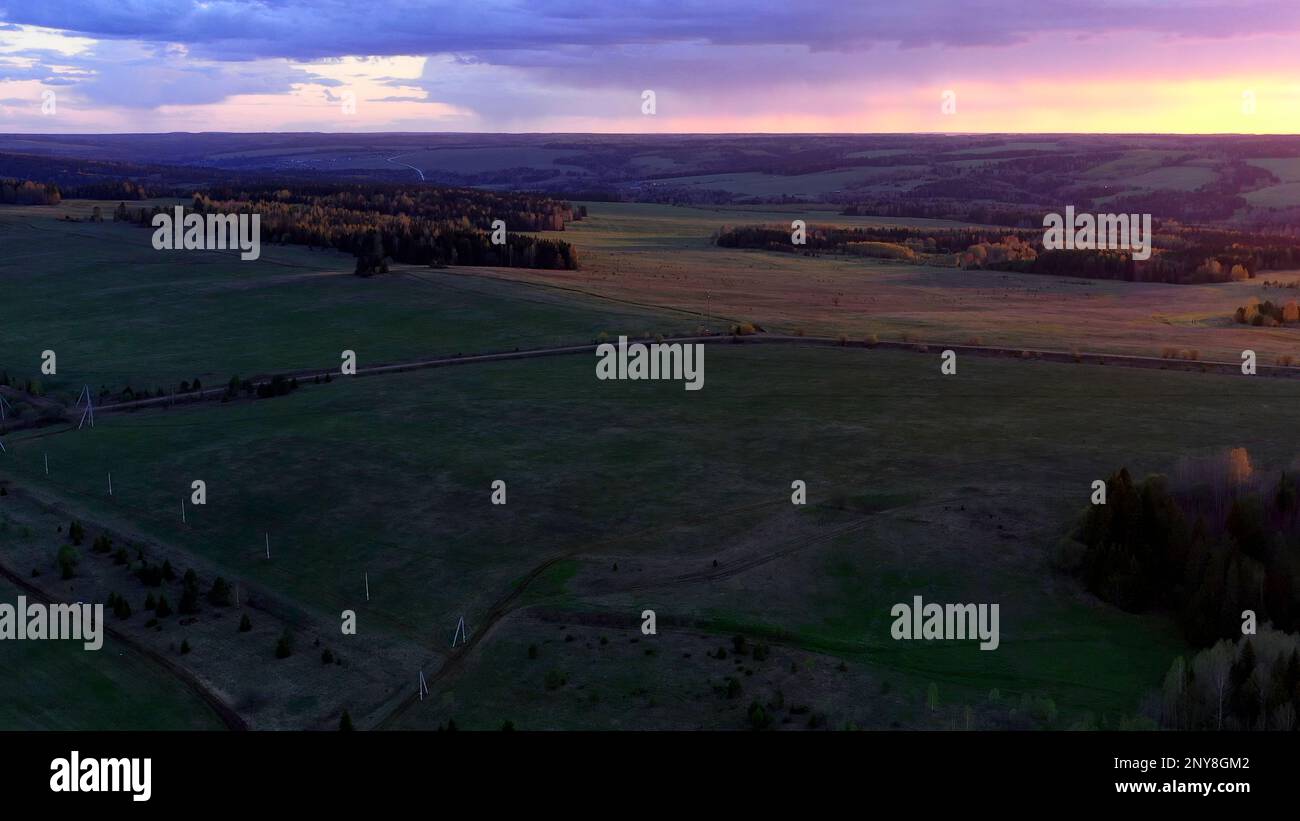 Aerial view beautiful summer sunset or sunrise. Clip. Drone flying over ...