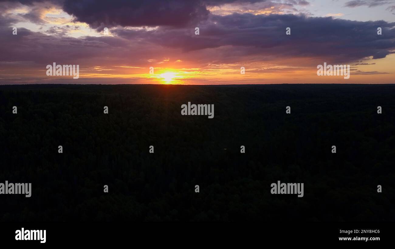 Aerial cinematic panoramic view of the farm field during sunset. Clip ...