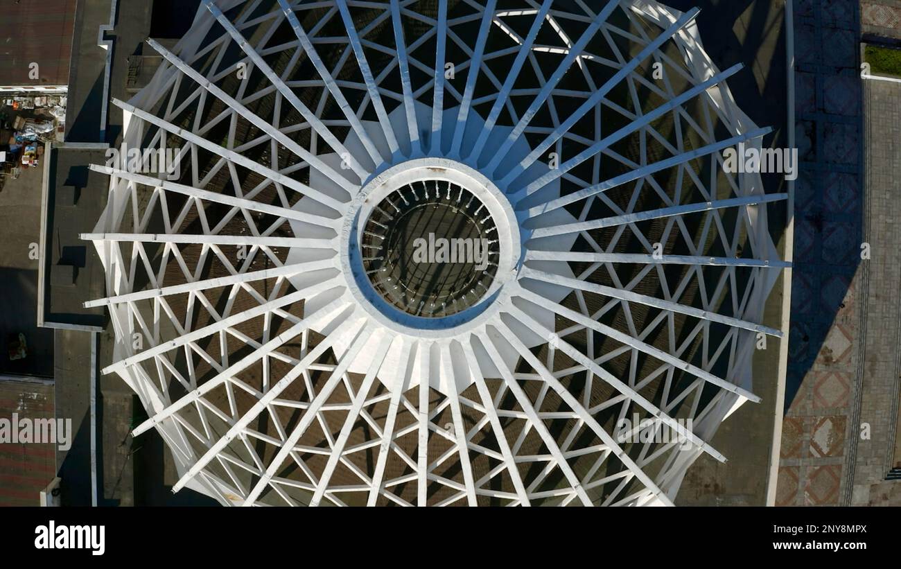 White carved dome of a city building. Stock footage. Aerial view of a ...