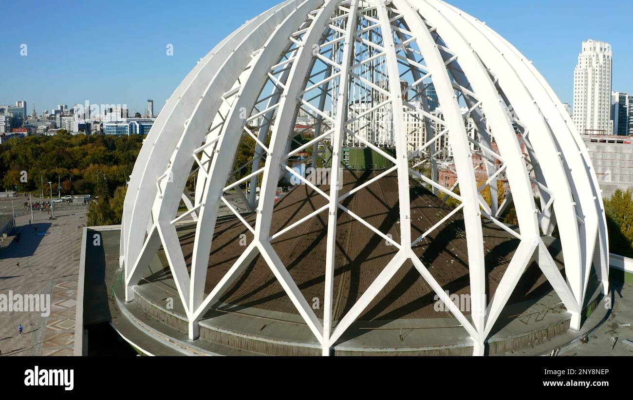 Aerial view of an unusual building with a spherical structure looking ...