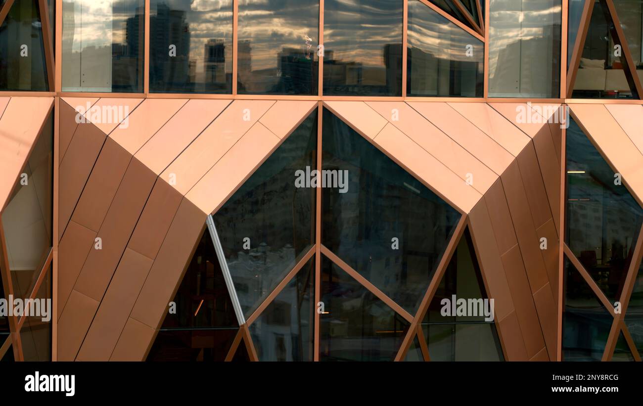 Aerial view of details of a new skyscraper of bronze color. Stock ...
