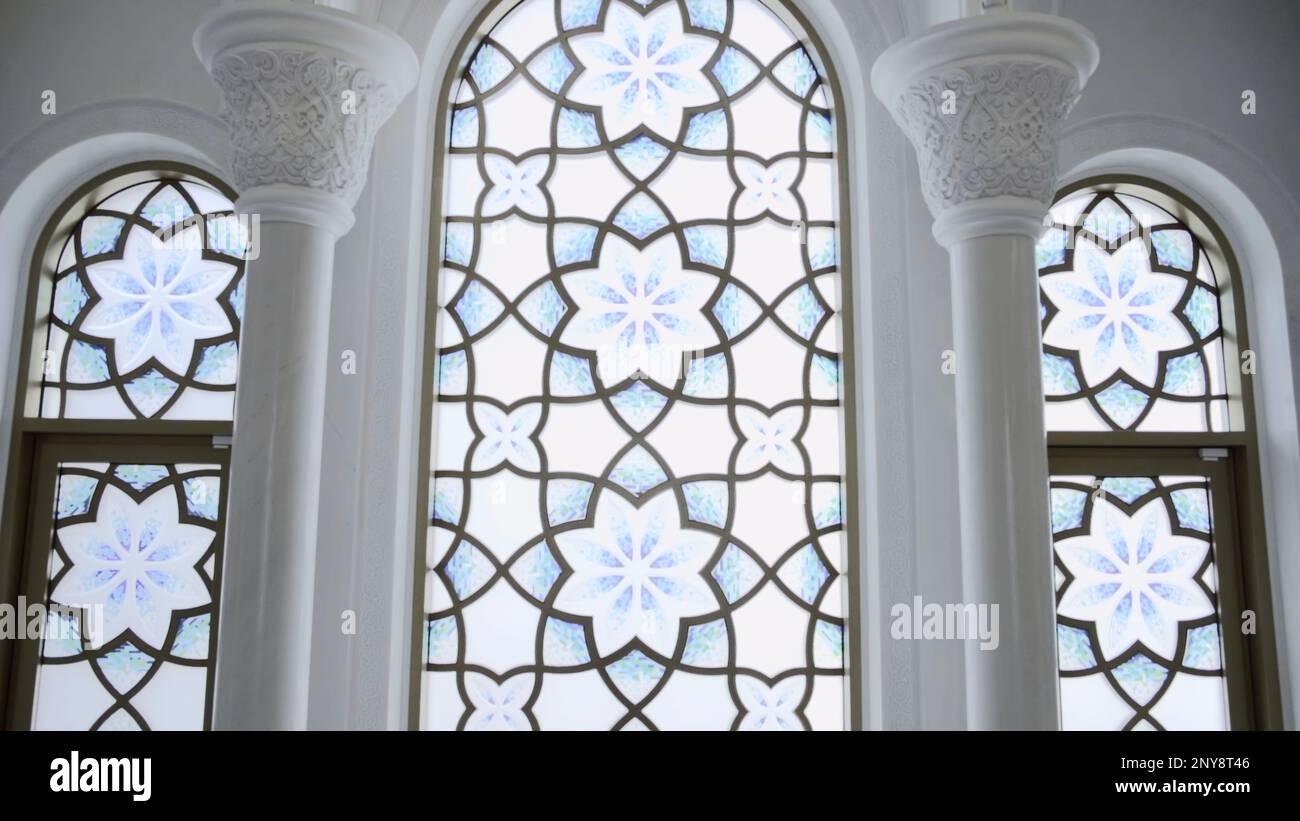 Amazing stained glass window inside spacious building or temple. Scene ...