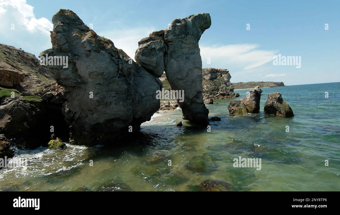 Aerial view of unusual rock formations on the paradise sea shore. Shot ...