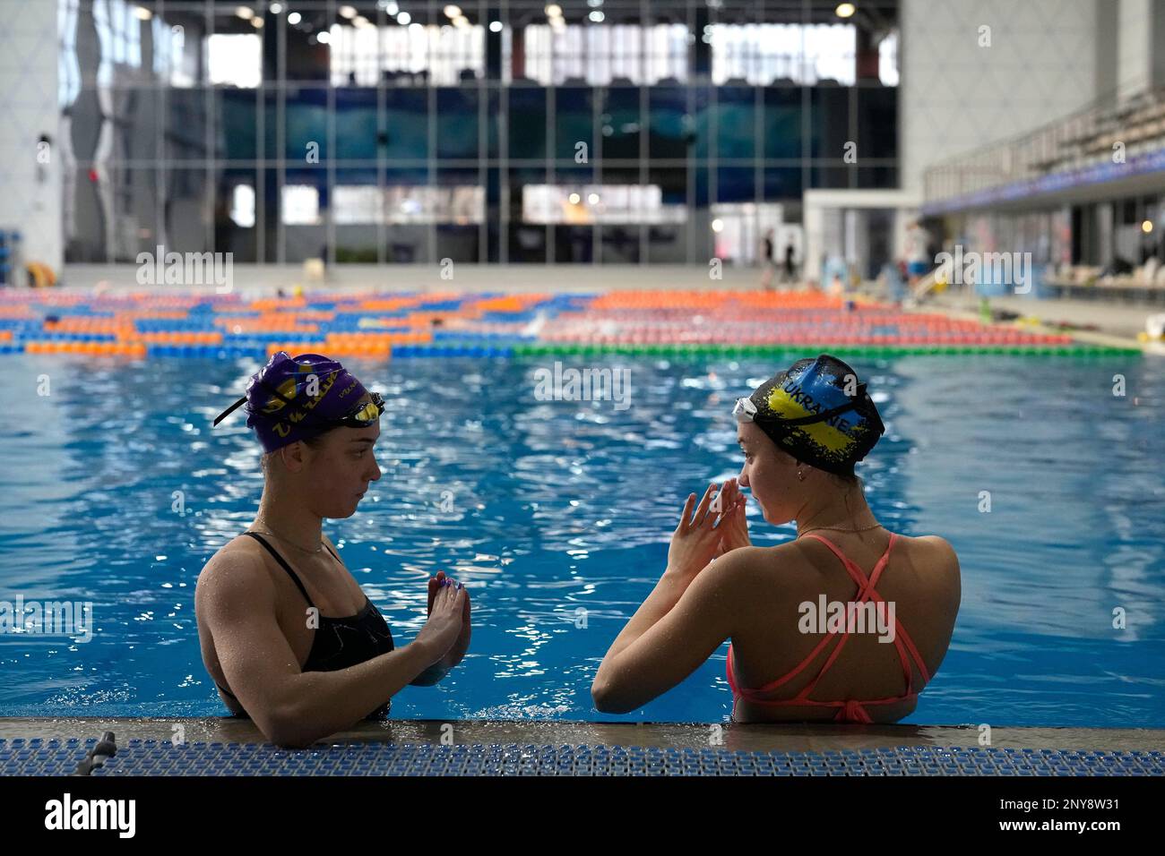 Ukrainian sisters Maryna, left, and Vladyslava Aleksiiva speak during a ...