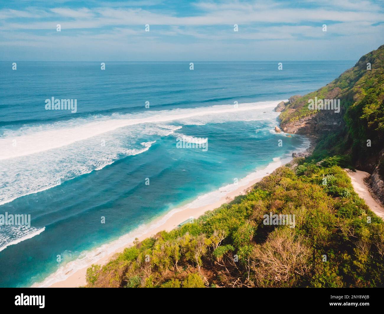 Amazing view of scenic coastline with beach, mountains and blue ocean ...