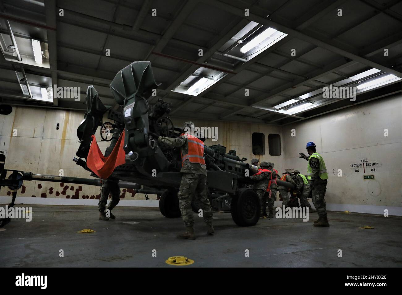 Soldiers of 1st Battalion, 37th Field Artillery Regiment position M777 ...
