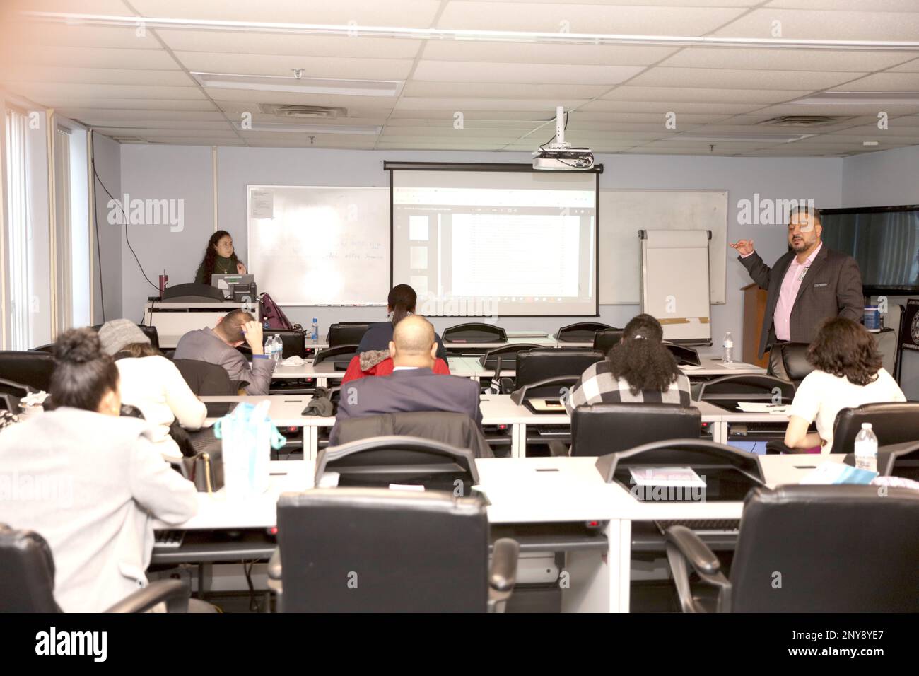 Adriana A. Mitchell, Cohort Facilitator talks to the mentees at the ...