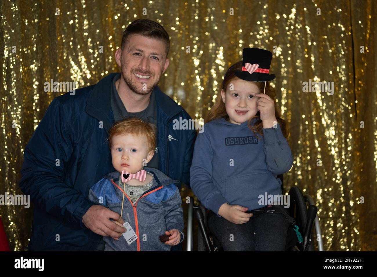 An Exceptional Family Member Program family poses for a photo during a ...