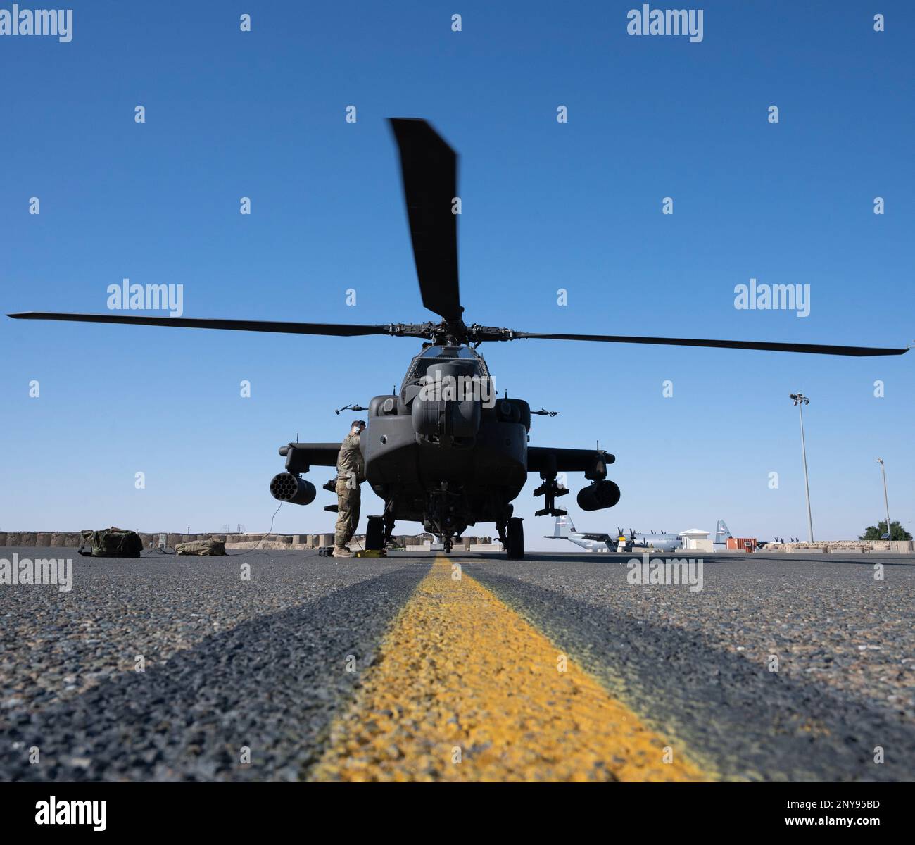 A U.S. Army AH-64E Apache helicopter from Task Force Rough Riders ...