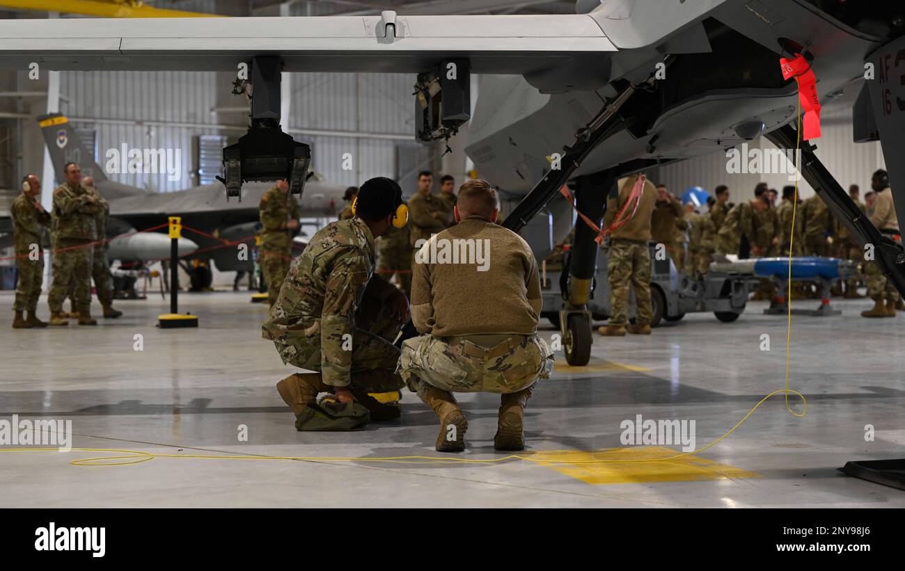 Weapons standardization Airmen inspect an MQ-9 during the 4th Quarter ...