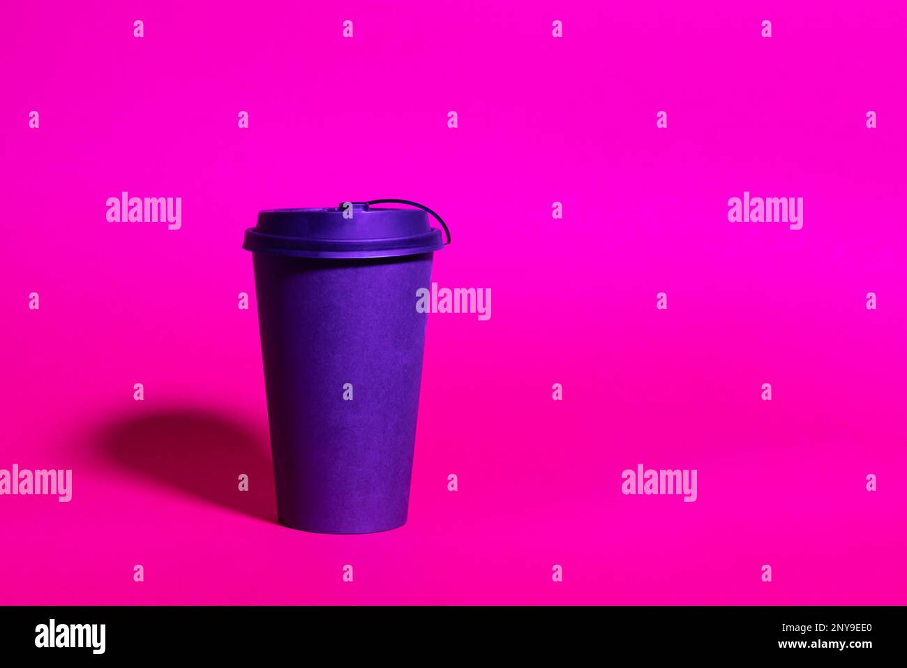 Mock up of black paper coffee cup ready to go, trend duotone neon ...