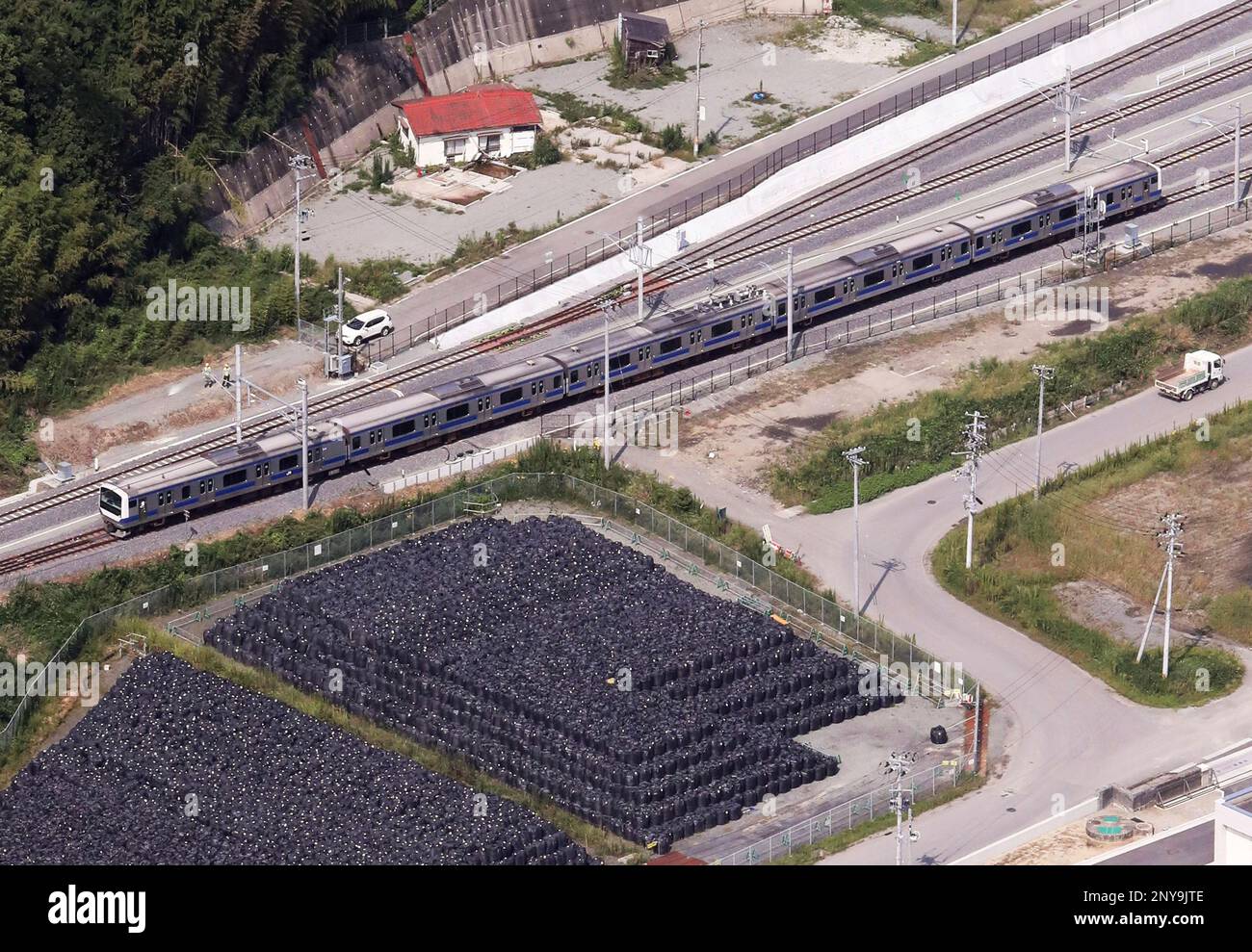 This aerial photo shows a test running of JR Joban line at Tomioka ...