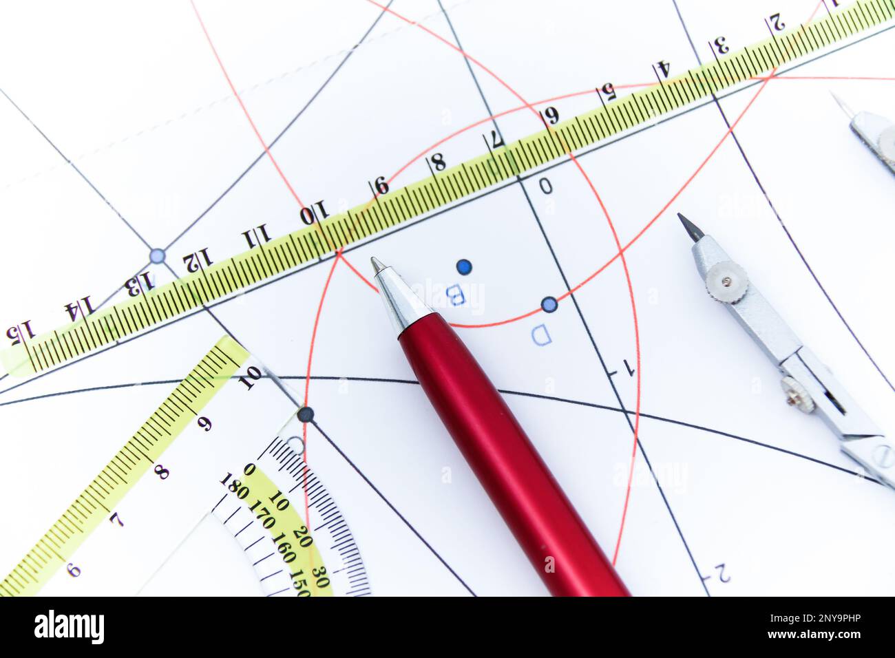Professional architect working at his desk, measuring and estimating ...