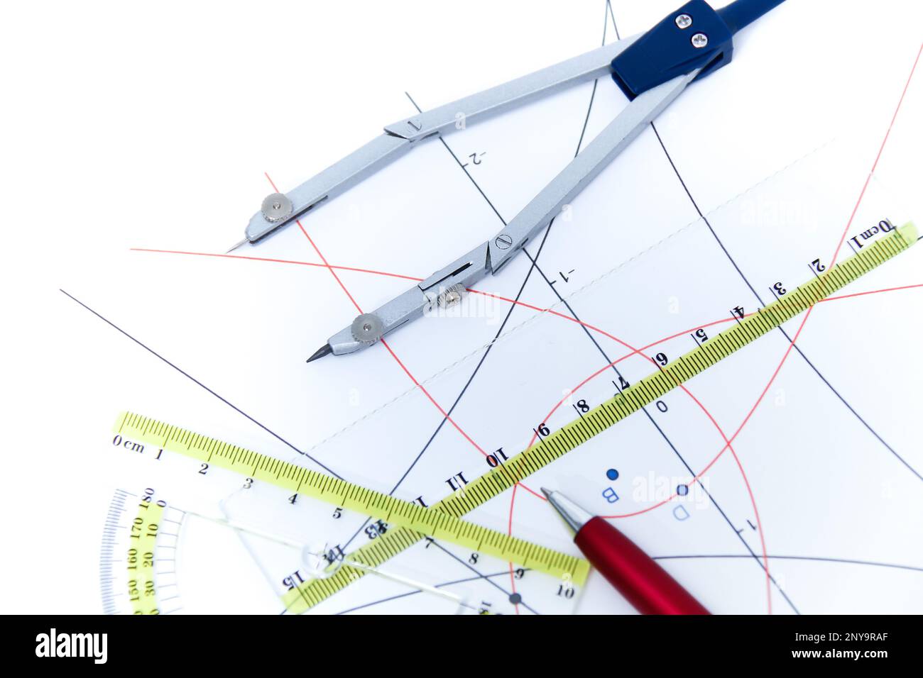 Professional architect working at his desk, measuring and estimating ...