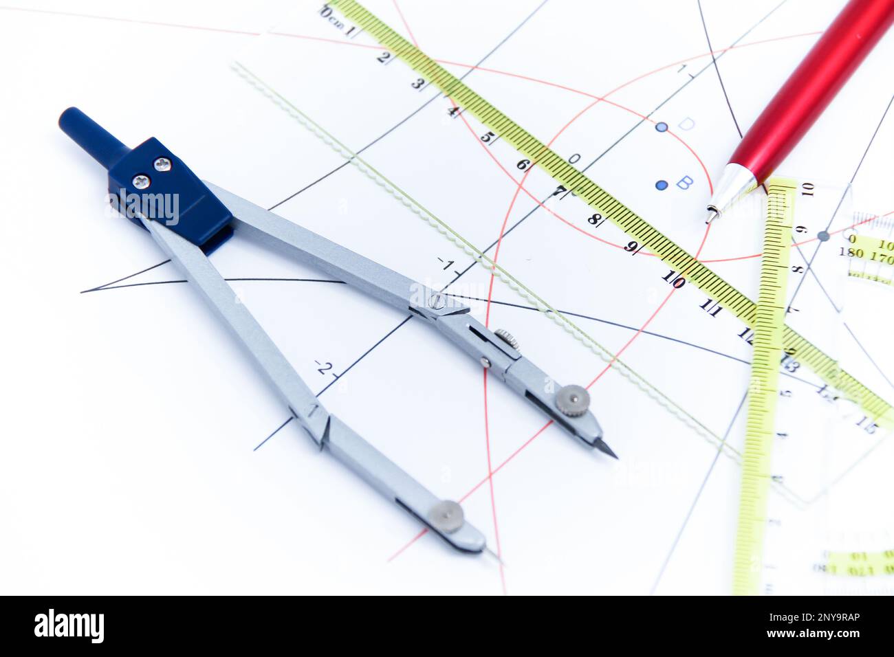 Professional architect working at his desk, measuring and estimating ...