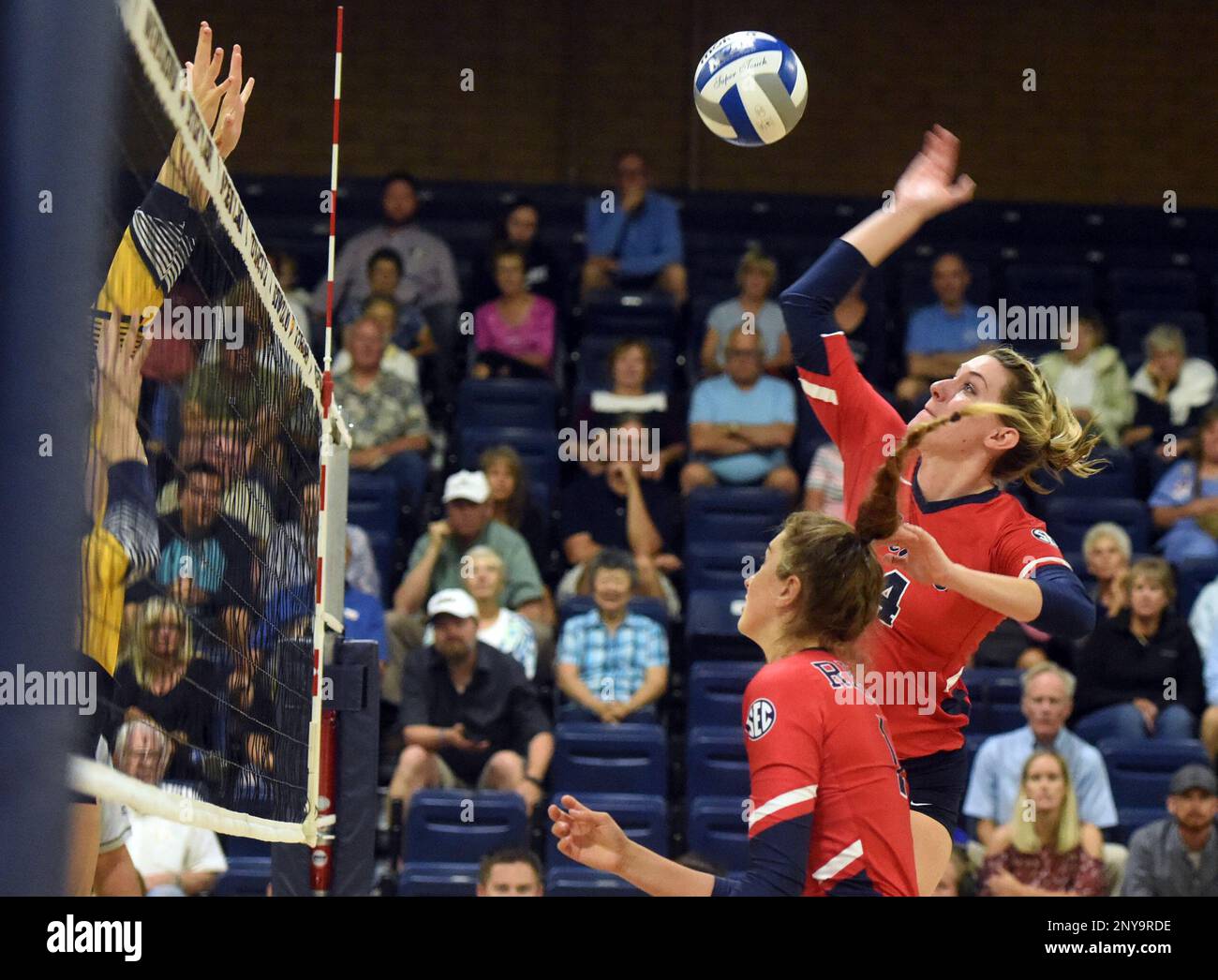 Mississippi's Delaney Gallagher jumps to spike the ball during an NCAA ...