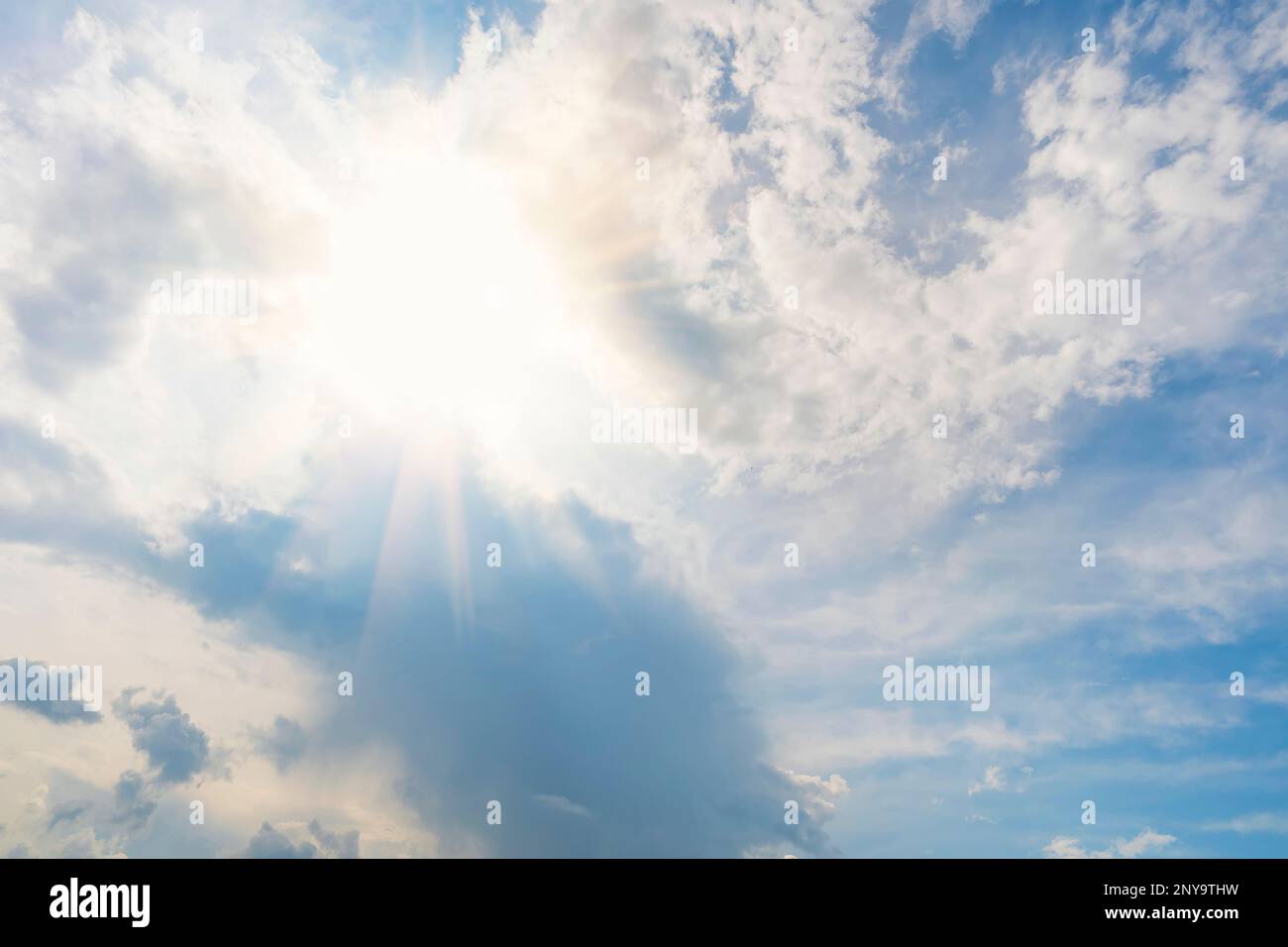 light from heaven. Sun and clouds. ecrice the rays of the sun shining ...