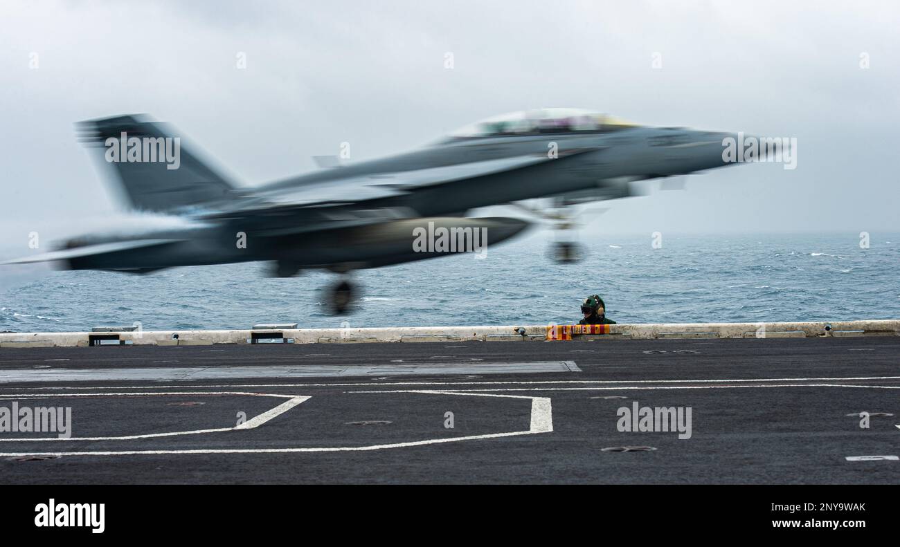230119-N-MH015-1116 SOUTH CHINA SEA (Jan. 19, 2023) An F/A-18F Super Hornet from the “Mighty ...