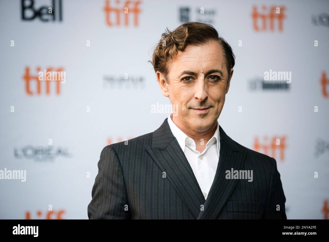 Actor Alan Cumming arrives before the screening of "The Battle of the ...
