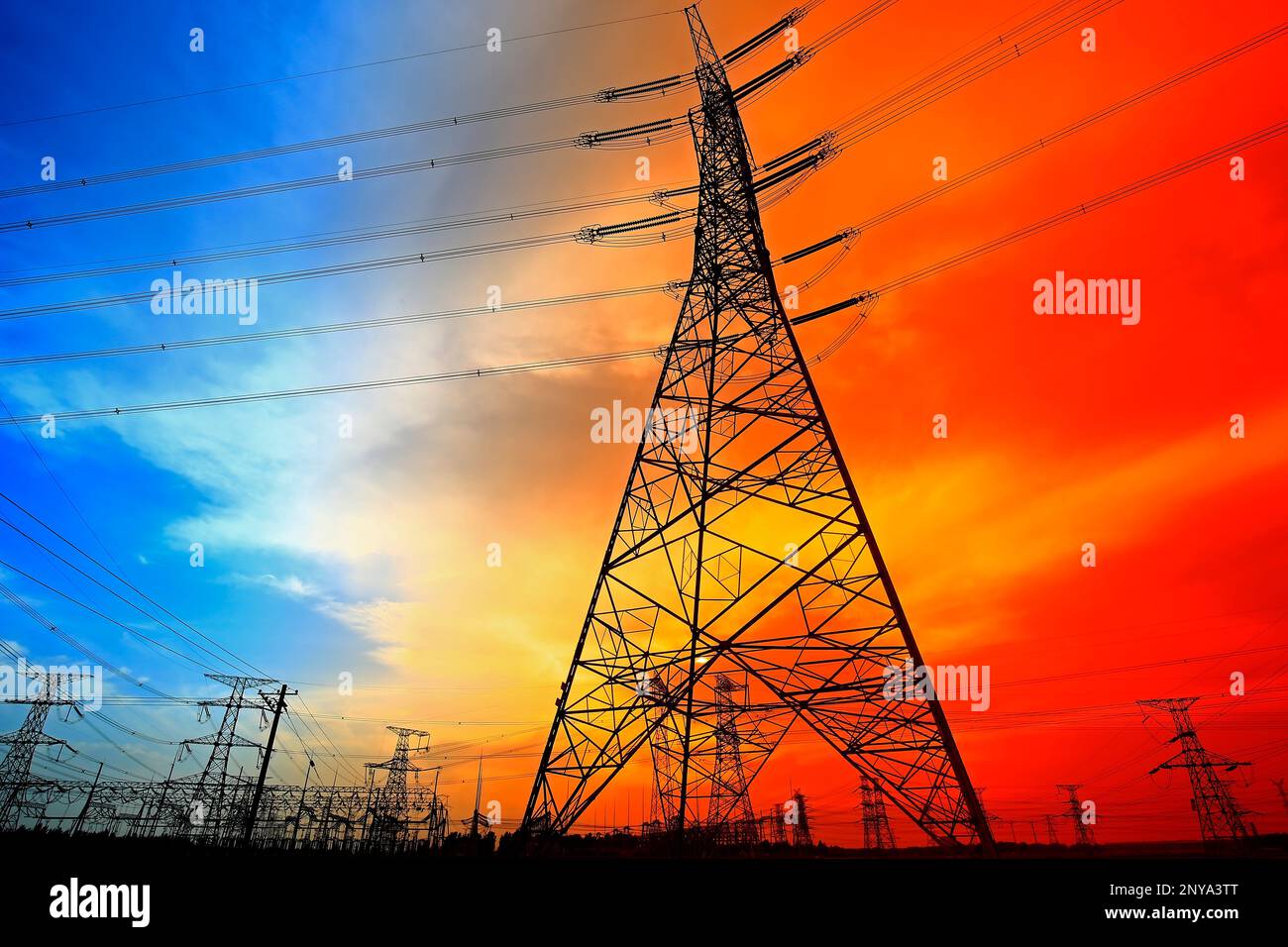 Electric tower, silhouette at sunset Stock Photo - Alamy