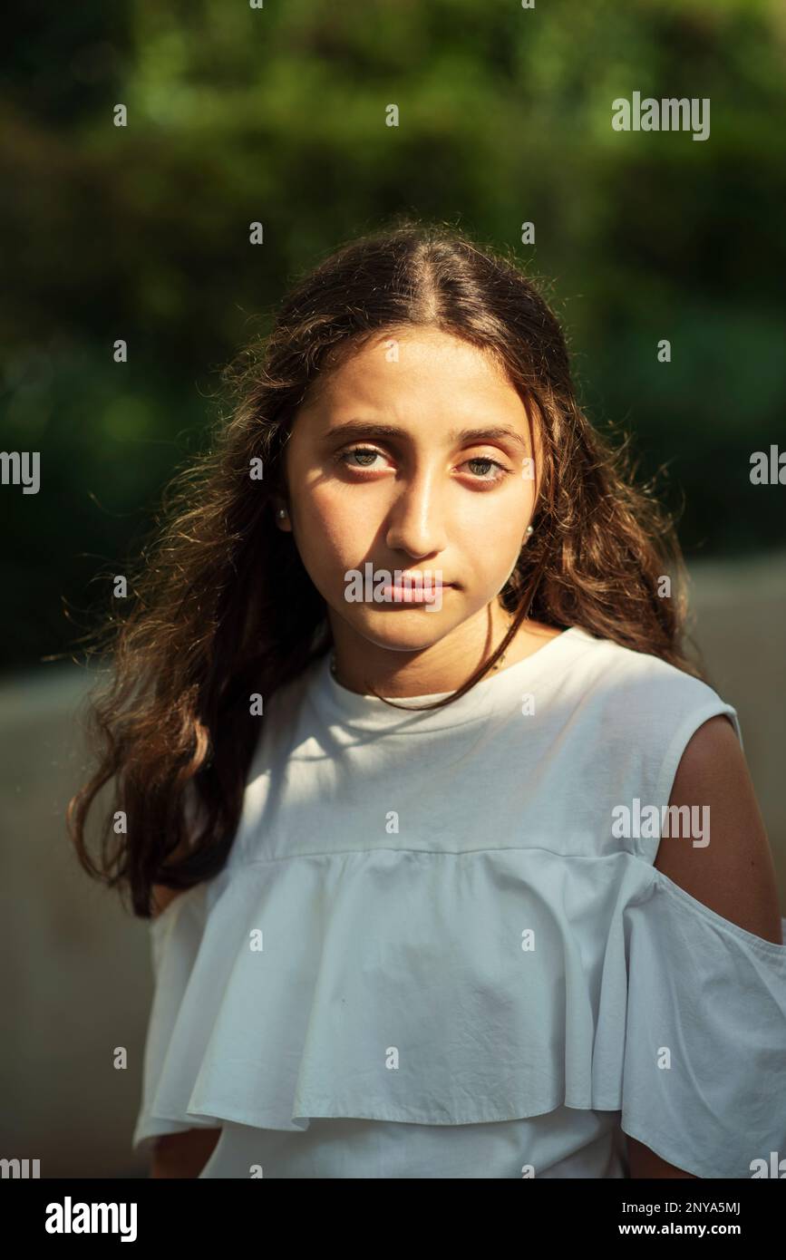 Serious hispanic teen teenage girl hi-res stock photography and images - Alamy