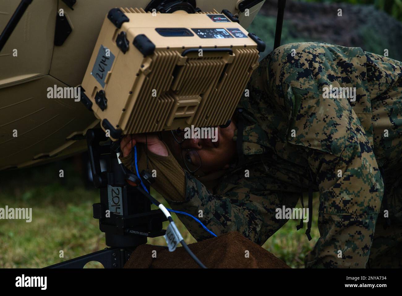U.S. Marine Corps Lance Cpl. Jesse Jimenez, a satellite communications ...