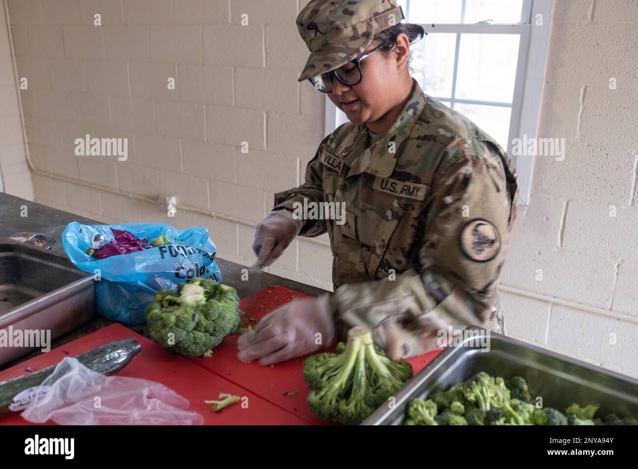 Members of the 375th Quartermaster Company (Field Feeding), HQ, 518th ...