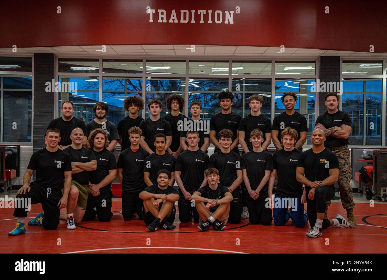 U.S. Marines and the Port Huron High School Wrestling Team pose for a ...
